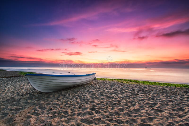 Boat and violet sunrise stock photo. Image of sunrise - 59657360