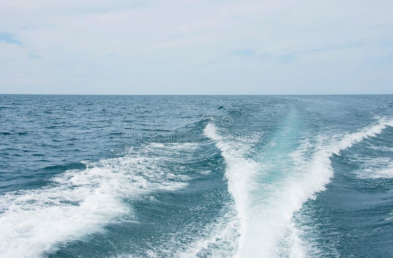 Boat wake on Lake Michigan stock photo. Image of michigan - 76957012