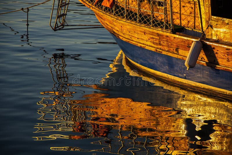 Boat and water reflection stock photo. Image of reflection - 63260296