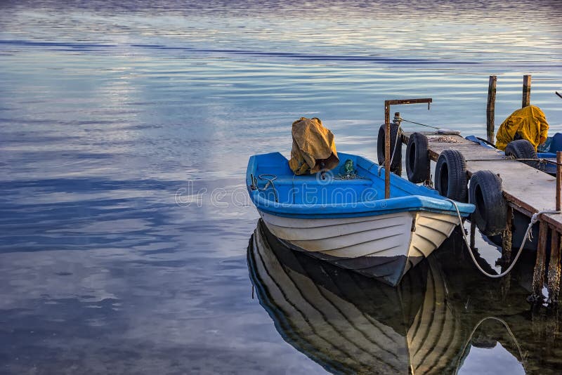 Boat with water reflection stock image. Image of harbor - 103958899