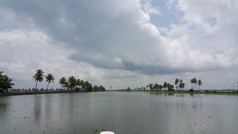 Boating in Azhapuzha, Kerala, India Stock Image - Image of bayou, cloud ...