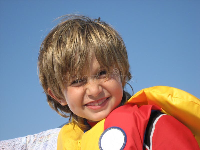 Boating Boy stock photo. Image of jacket, action, smiley - 14229714