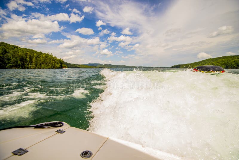 Boating on a Lake in the Mountains Stock Photo - Image of clouds ...