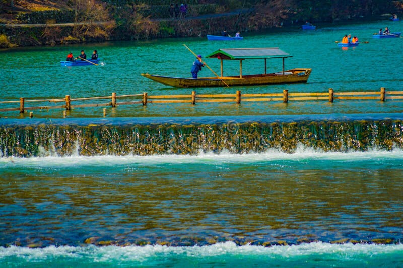 Boating scene on the river editorial image. Image of fisherman - 349241780