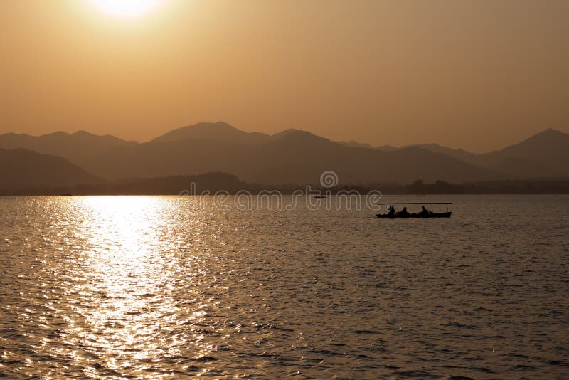 Boating with sun set stock image. Image of ease, reflection - 22396731