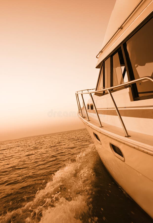Boating at sunset stock image. Image of motorboat, outdoors - 10309705