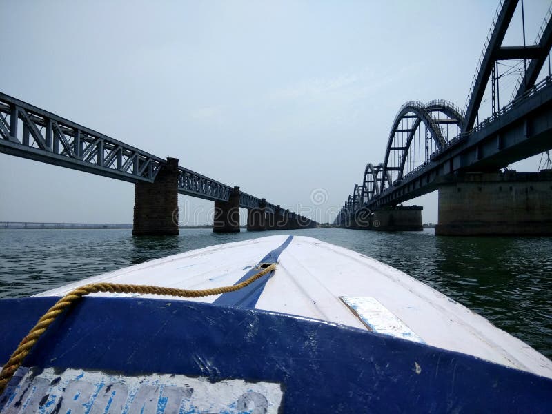 Boating through Two Bridges Stock Image - Image of boating, transport ...