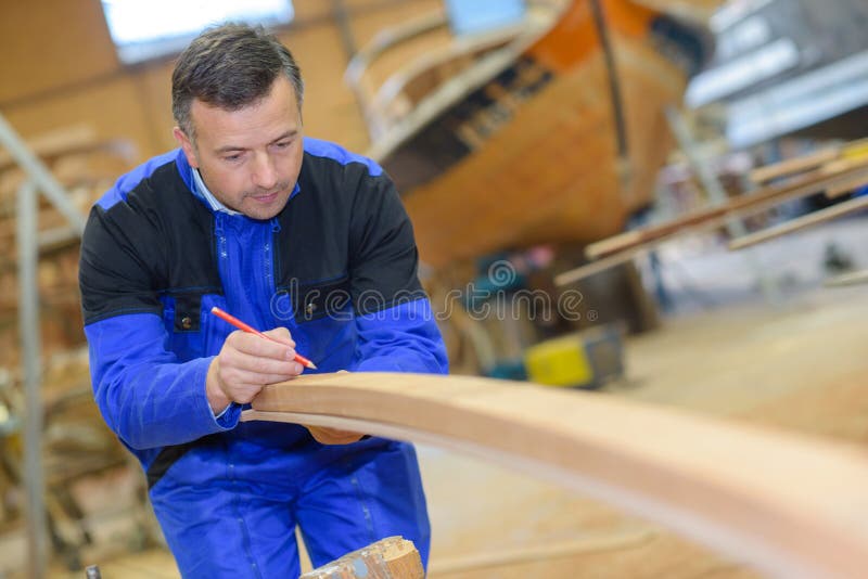 Boatmaker Marking Position on Curved Length Wood Stock Image - Image of ...
