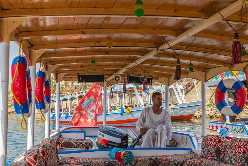 Boatman Driving A Tourist Boat On The Nile Egypt Editorial Stock Image