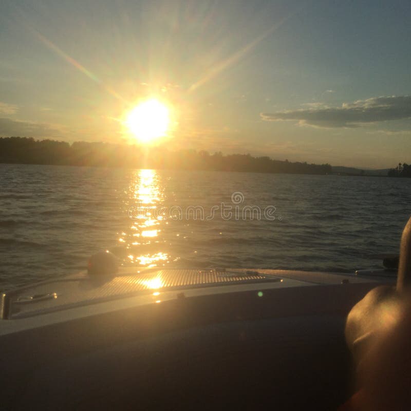 Boatride sunset stock photo. Image of sunset, lake, ride - 76391242