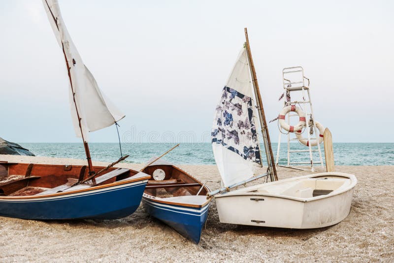 Boats on a beach stock photo. Image of cruise, boat - 222625028