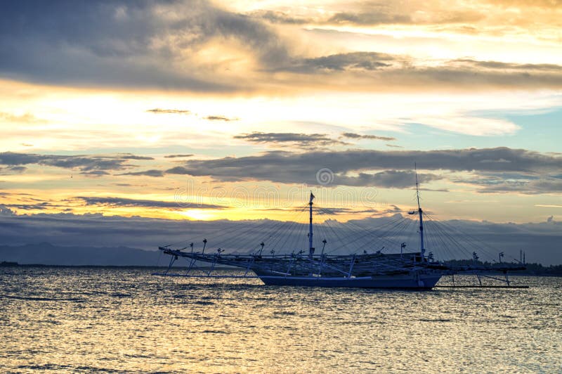 Sunset with Boat Views on the Beach Stock Image - Image of horizon ...