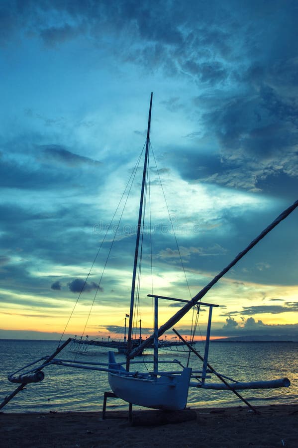 Sunset with Boat Views on the Beach Stock Photo - Image of beautiful ...