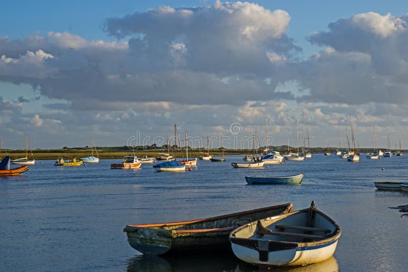 Boats on Brancaster Straithe Stock Image - Image of sailing, clouds ...