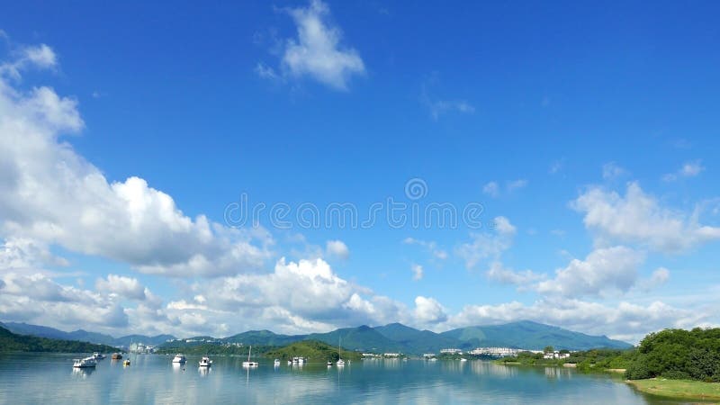 Boats, Clouds, Lake and Blue Sky with Reflection Shadow Stock Photo ...