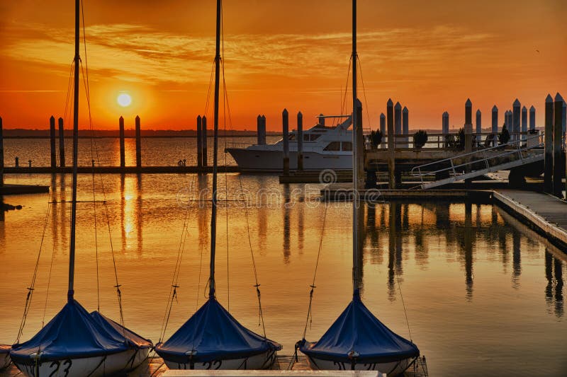 Boats at dawn stock photo. Image of pier, boat, sailboat - 24449124