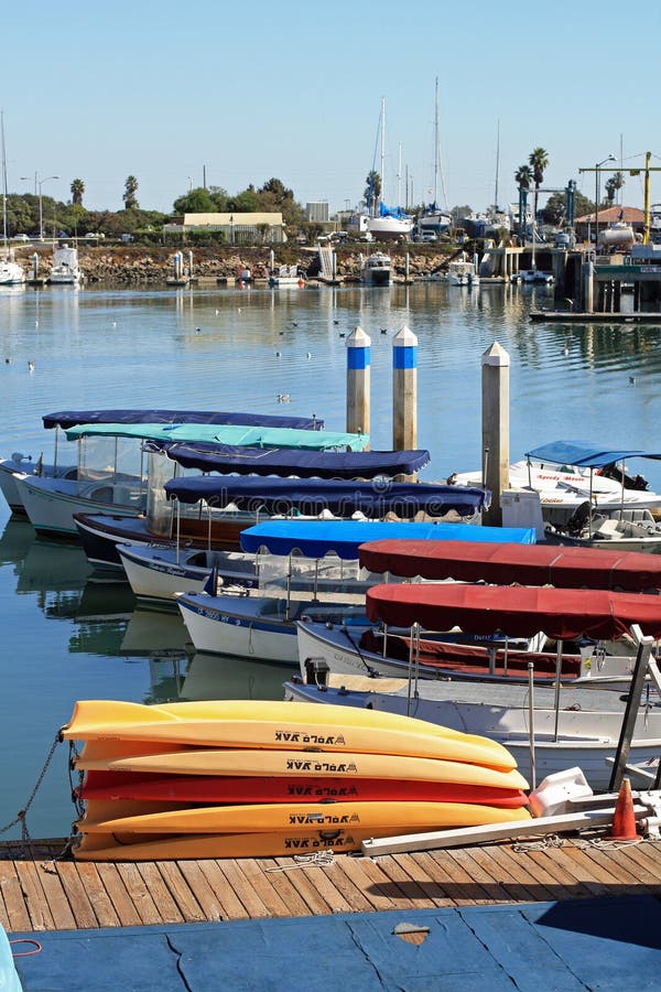 Boats at dock stock photo. Image of kayaks, marina, boats - 27543398