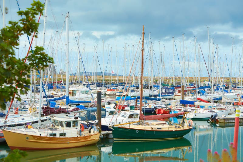 Boats in Harbor with Blue Colorful Cloudy Sky in Background. Stock ...