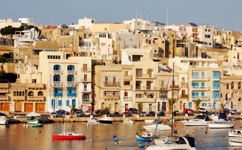 Boats and houses in Malta editorial photography. Image of dock - 170092032