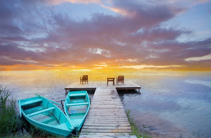 Boats, Jetty and Beautiful Colourful Sunset Stock Photo - Image of ...