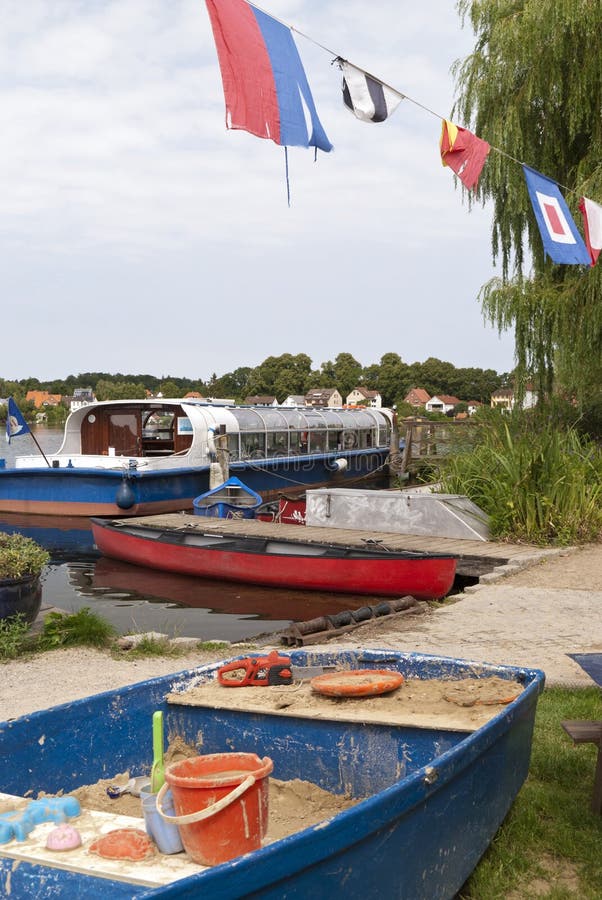 Boats on a Lake stock image. Image of boats, jetty, pedalo - 58179879