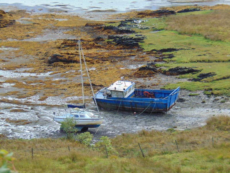 Boats at low tide stock photo. Image of boats, landscape - 131607582