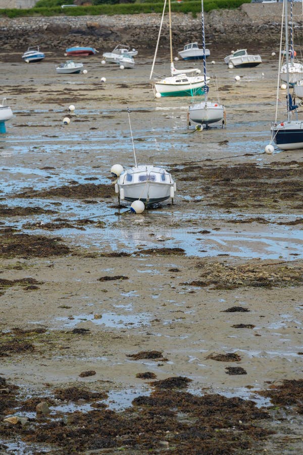 Boats at low tide stock photo. Image of small, tide - 138889060