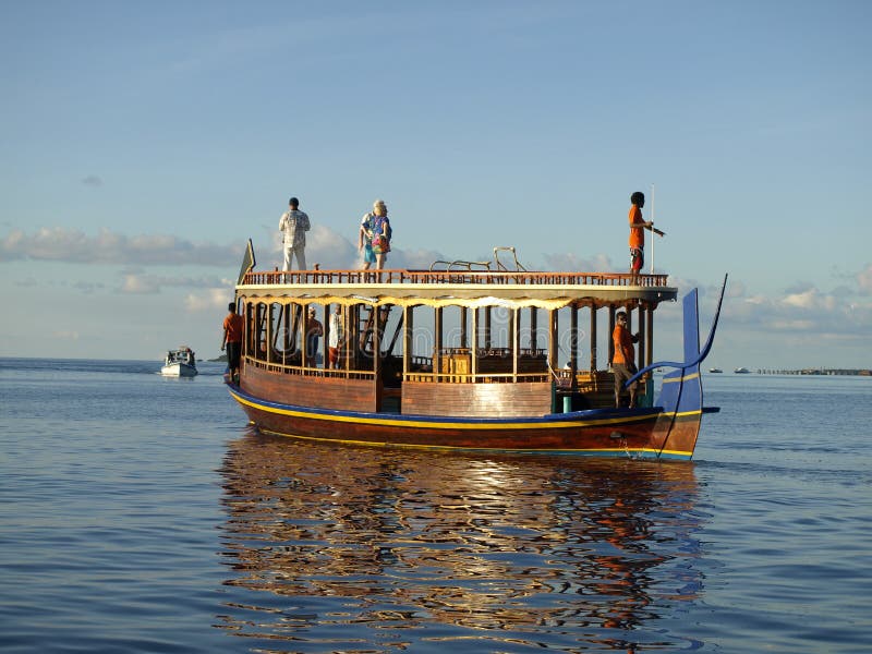 Boats on the Maledivan sea editorial photo. Image of beach - 128830166