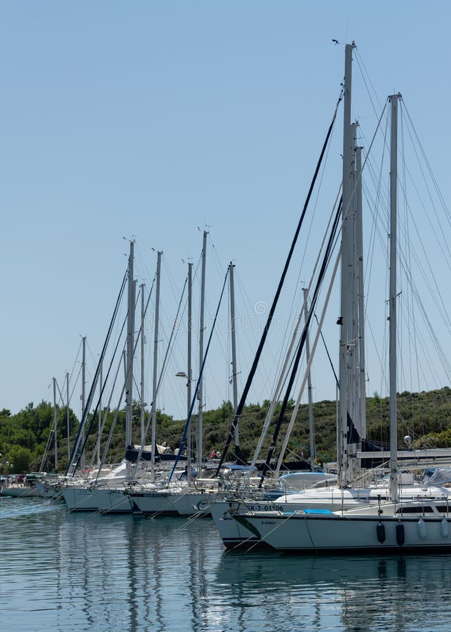 Boats with mast moored stock photo. Image of pier, water - 334339246