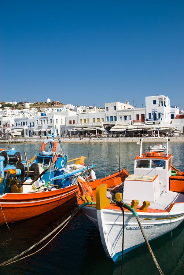 Boats Moored To Dock Posts with Ropes in a Harbor Stock Photo - Image ...
