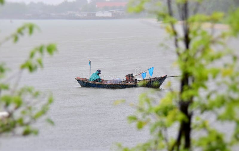 Boats in the Rain stock image. Image of raining, fishing - 78898037