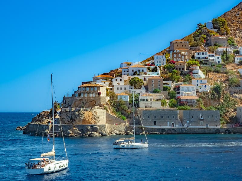 Boats Sailing into Hydra stock image. Image of nature - 262527453
