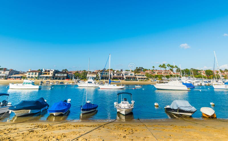 Boats by the Shore in Balboa Island Stock Image - Image of work, wharf ...
