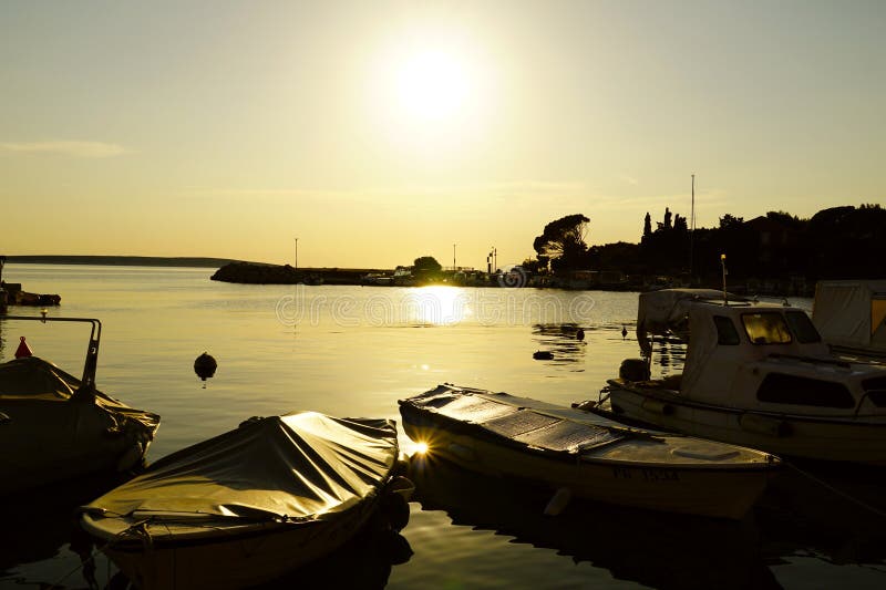 Boats and Small Ships in a Small Harbor Tied To the Shore Editorial ...