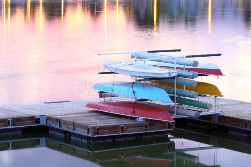 Boats Stacket on Dock at Sunset Stock Photo - Image of relaxation ...