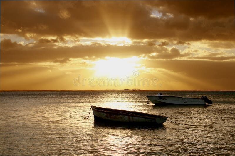 Boats at sunset stock image. Image of tranquil, sunset - 5871967