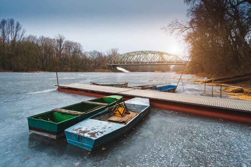 Boats on winter dock stock image. Image of sunset, peaceful - 184694285
