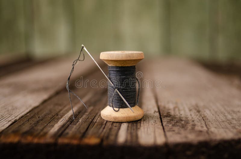 Bobbin Black Thread Needle Stuck Stands Wooden Table Stock Photos ...