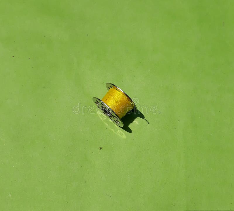 A bobbin or spool is a Spindle or Cylinder, with or without flanges, on ...