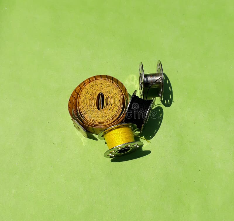 A bobbin or spool is a Spindle or Cylinder, with or without flanges, on ...