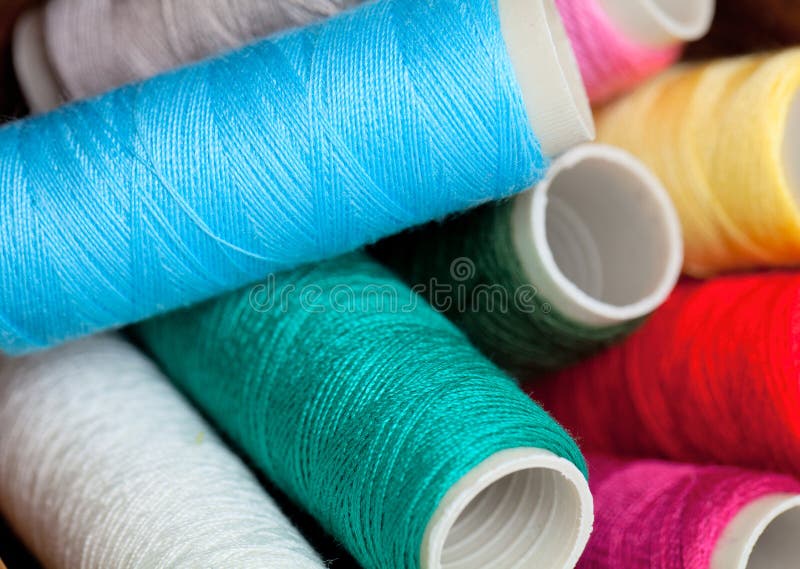 Bobbins of thread close up stock photo. Image of cotton - 28450554