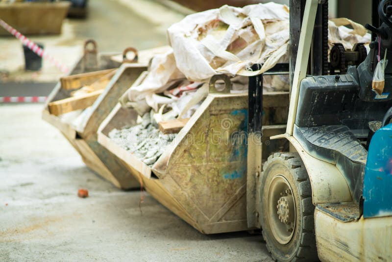Bobcat or a Skid Loader in a Construction. View from Behind Stock Photo ...