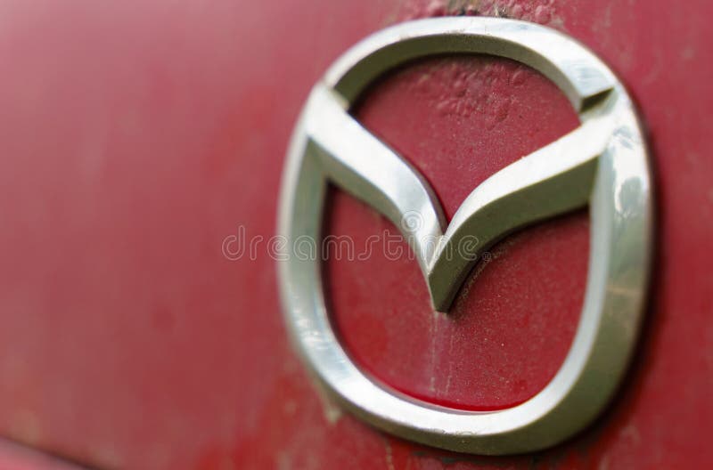 Close-up of the Mazda Logo on a Car from the 90s. Editorial Photography ...
