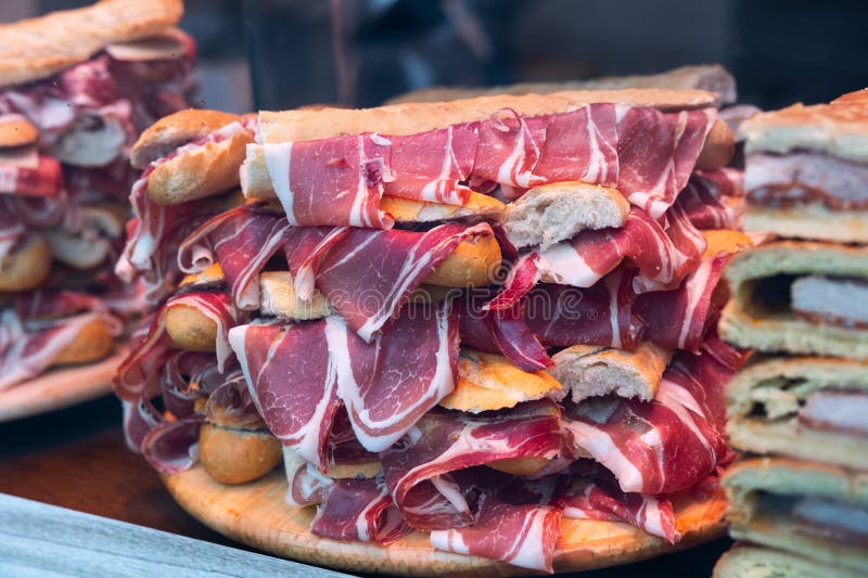 Bocadillos on Showcase of Spanish Fast Food Cafe Stock Photo - Image of ...