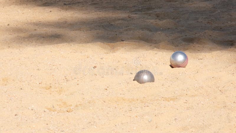 Bocce balls on sandy beach stock footage. Video of challenge - 318304840