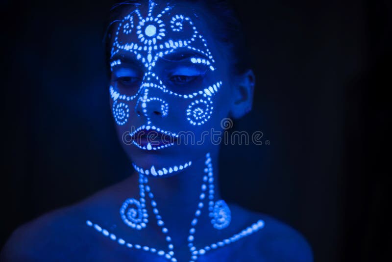 Body Art on the Body and Hand of a Girl Glowing in the Ultraviolet ...