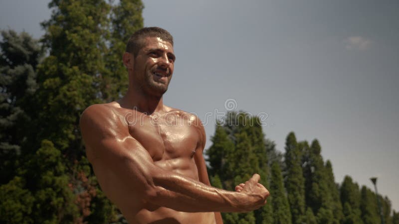 Body Builder Showing and Flexing Chest Muscles during Training Stock ...
