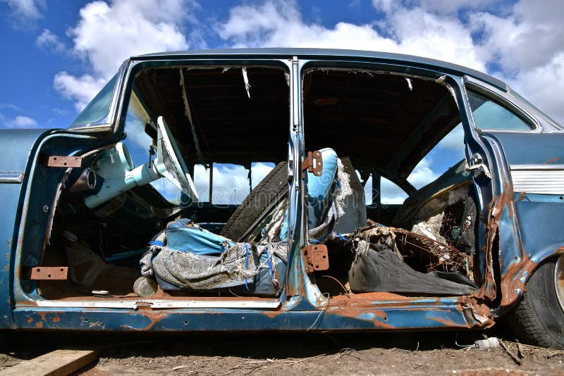 The Body of a Car from the 50`s with Door Missing and a Torn-up ...