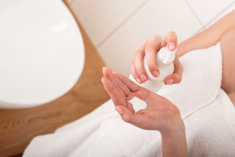 Body Care - Young Woman Applying Lotion Stock Photo - Image of apply ...
