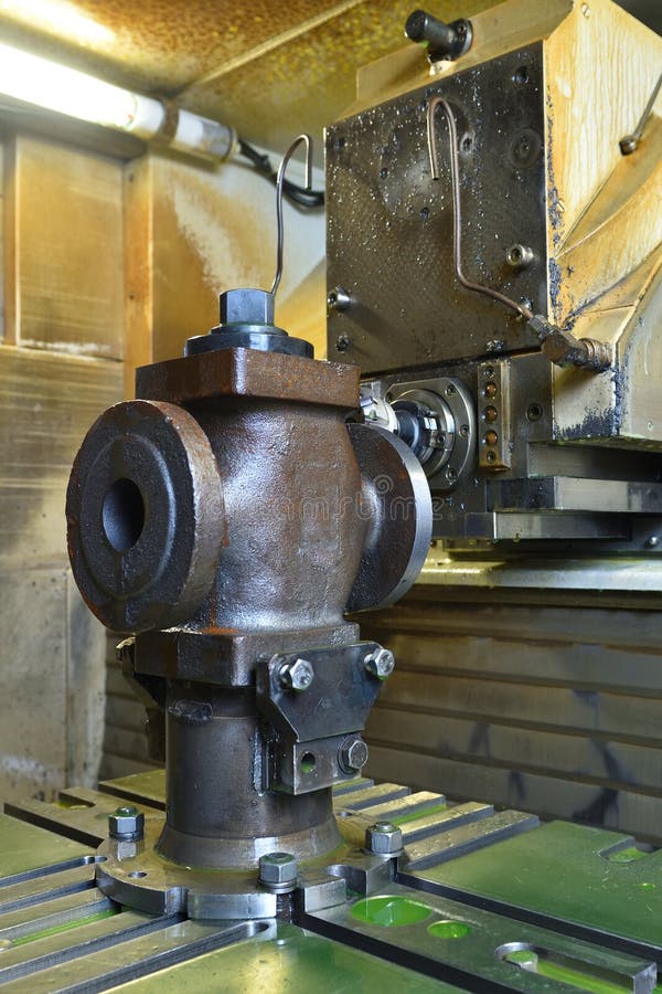 The Body for Creating the Valve is Installed on the Table of the CNC ...